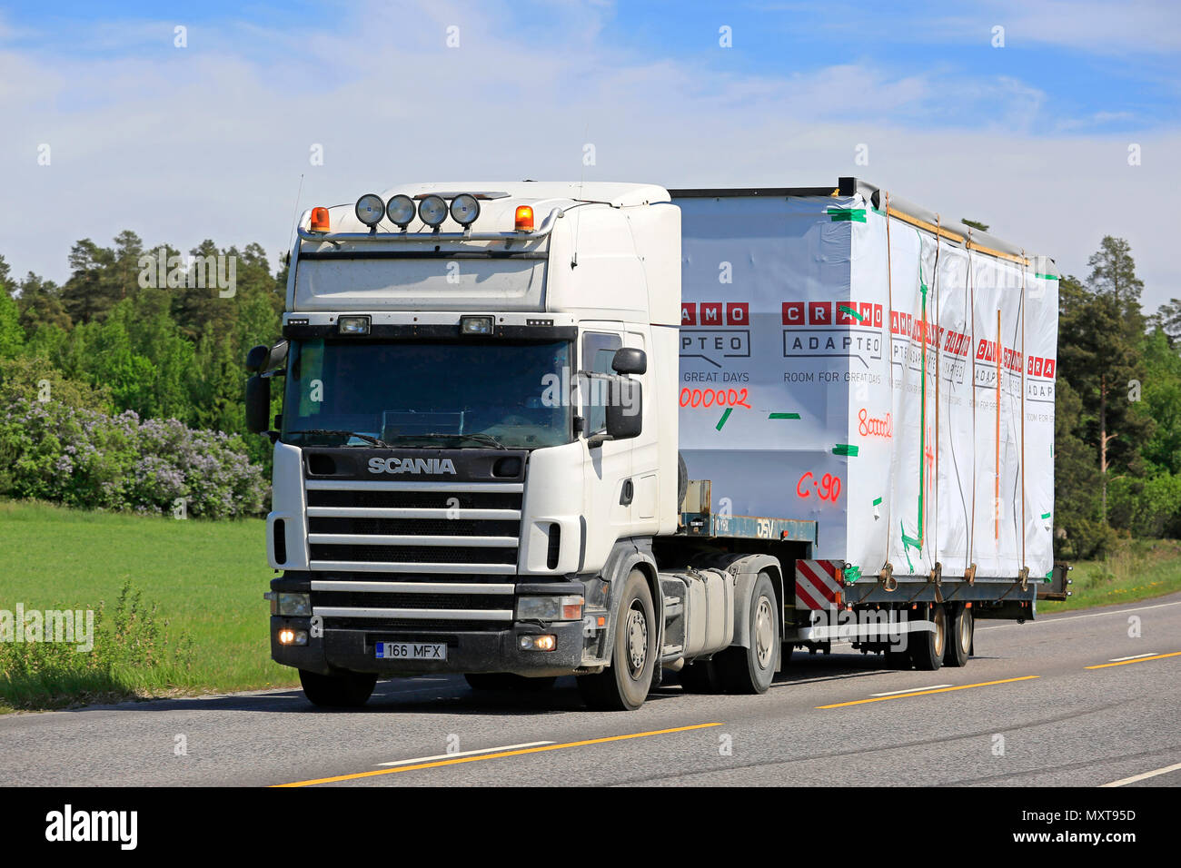 White Scania semi trailer hauls Cramo Adapteo Modular Space unit as ...