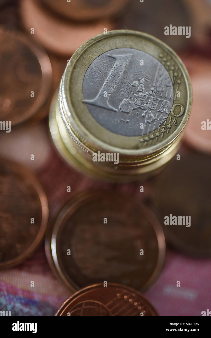 A lot of coins and euro bills Stock Photo - Alamy