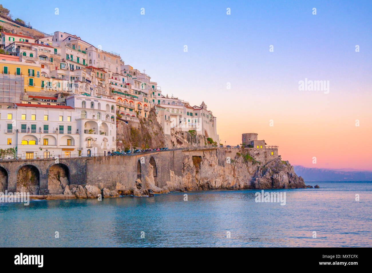 Sunset on the Amalfi Coast, The charming town of Amalfi Stock Photo - Alamy