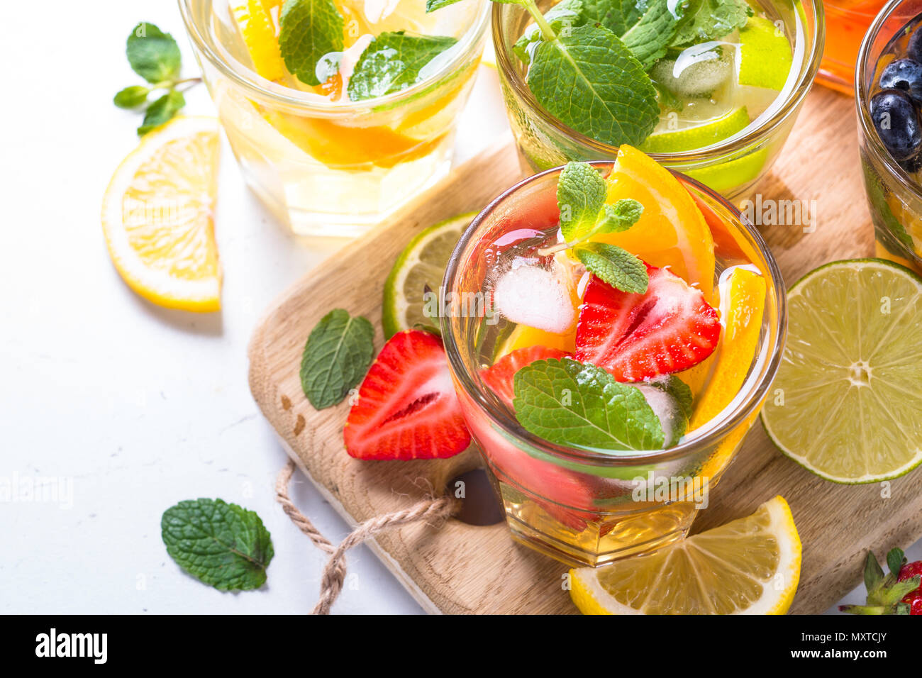 Lemonade set. Cold summer drink assortment. Lemonade, mojito and berry ...