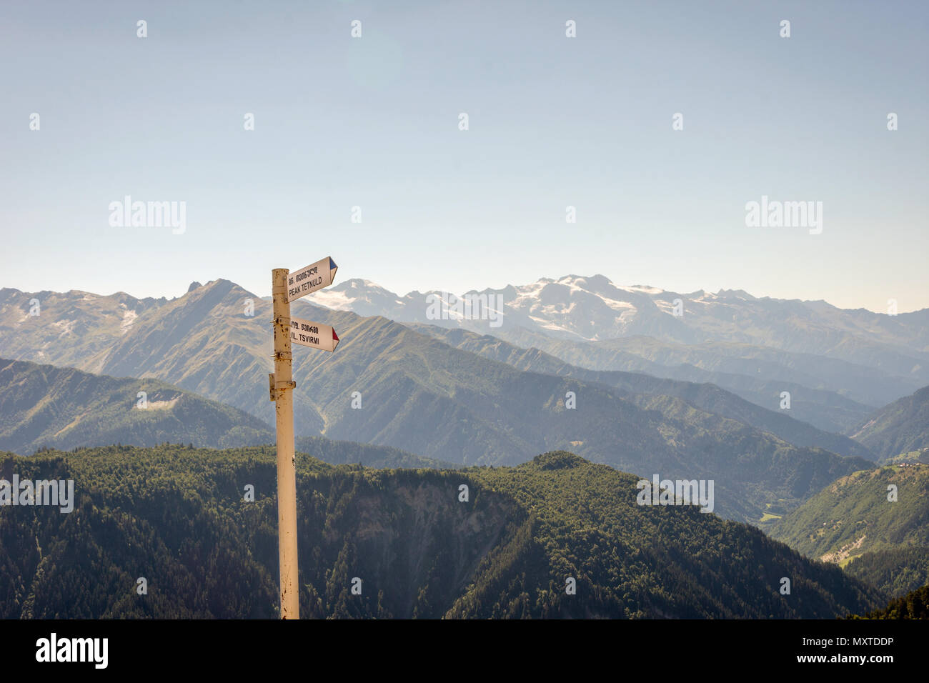 Trekking route marks in Svaneti region, Georgia Stock Photo - Alamy