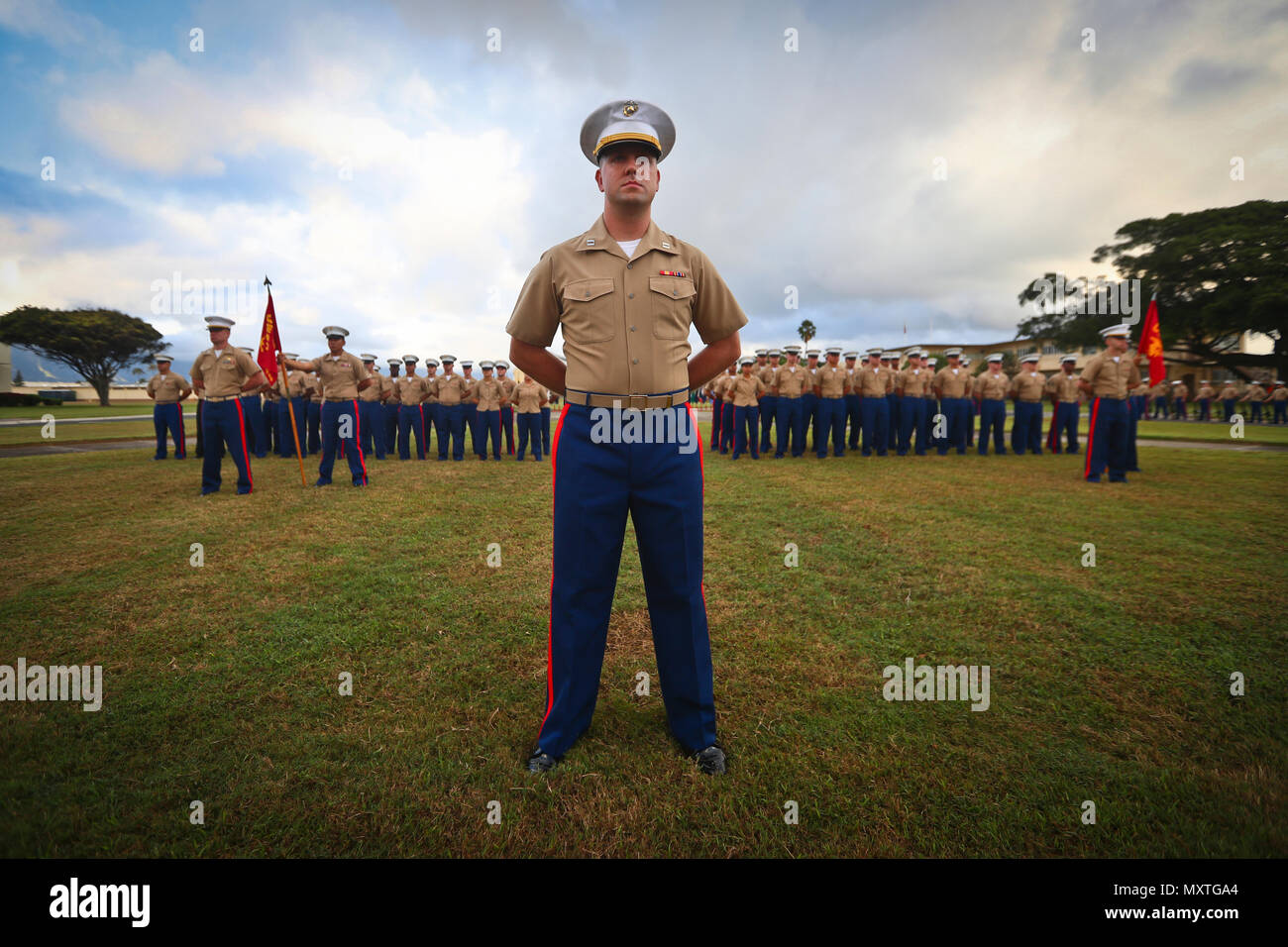 U.S. Marines assigned to Headquarters Battalion, MCB Hawaii, stand in ...