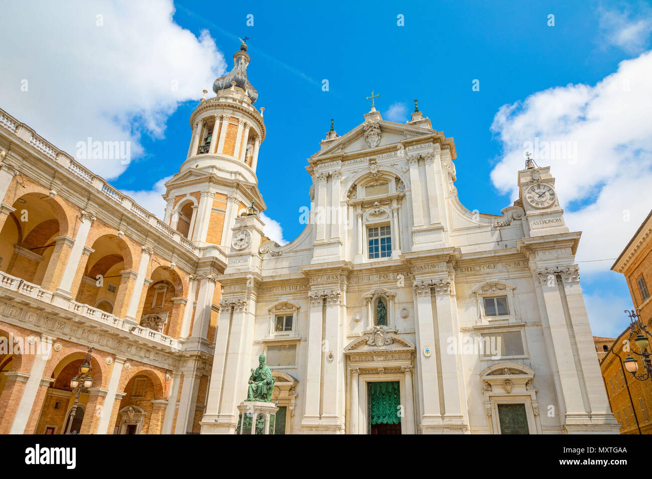 Loreto basilica in sunny day, sculpture and tower, Italy Stock Photo ...