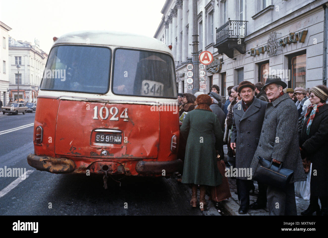 Passengers at bus stop in Warsaw, Poland Stock Photo - Alamy