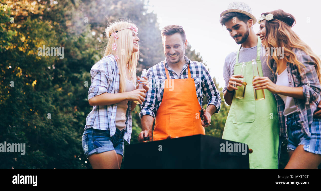 Friends talking bbq party hi-res stock photography and images - Alamy