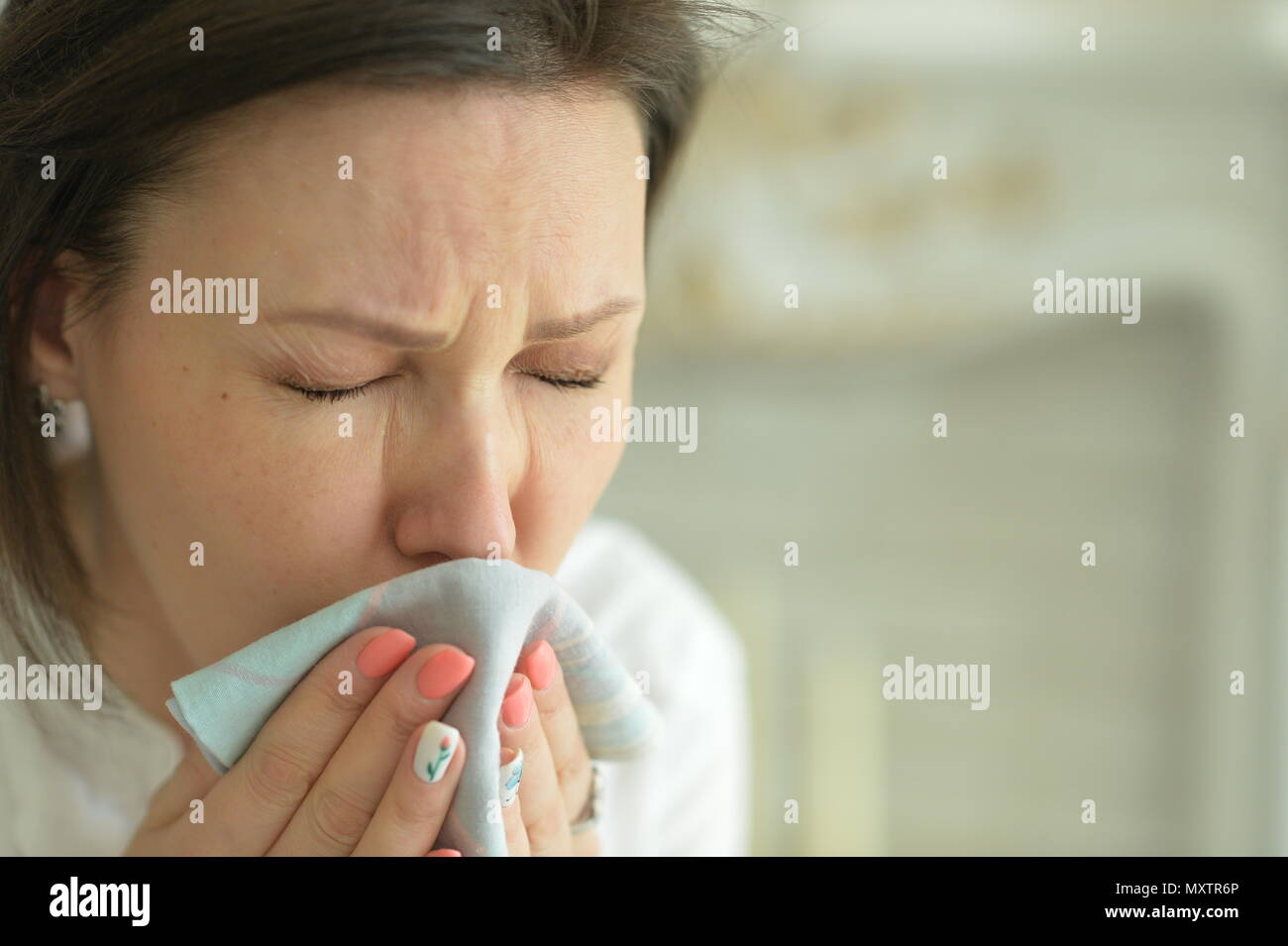 Sick Young woman crying Stock Photo - Alamy