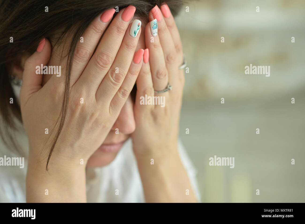 Sick Young woman crying Stock Photo - Alamy