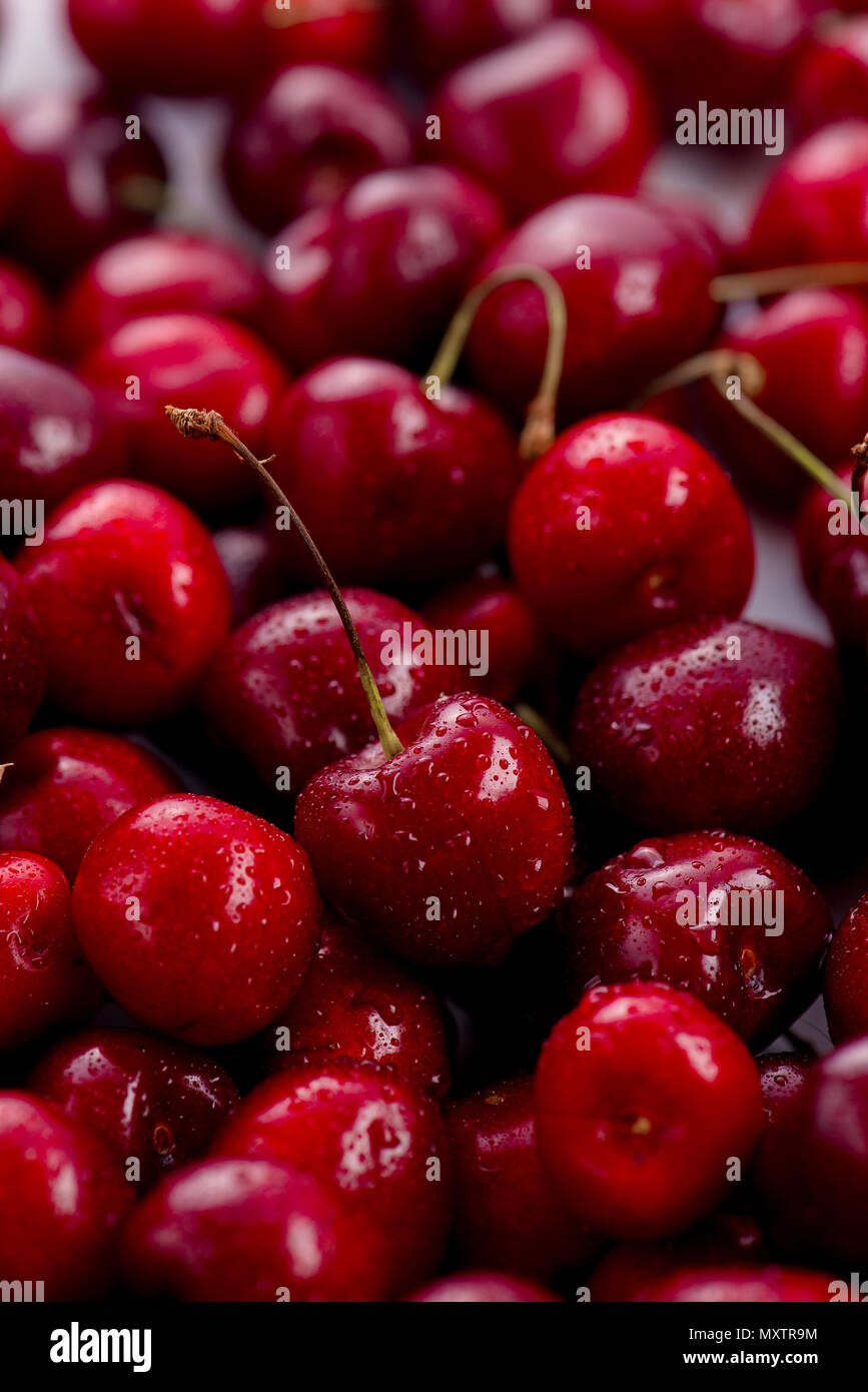 Cherries with water drops close-up. Macro berries shot with copy space ...
