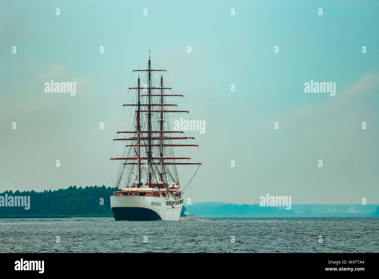 Big white sailing ship with three mast moving to the Riga port Stock ...