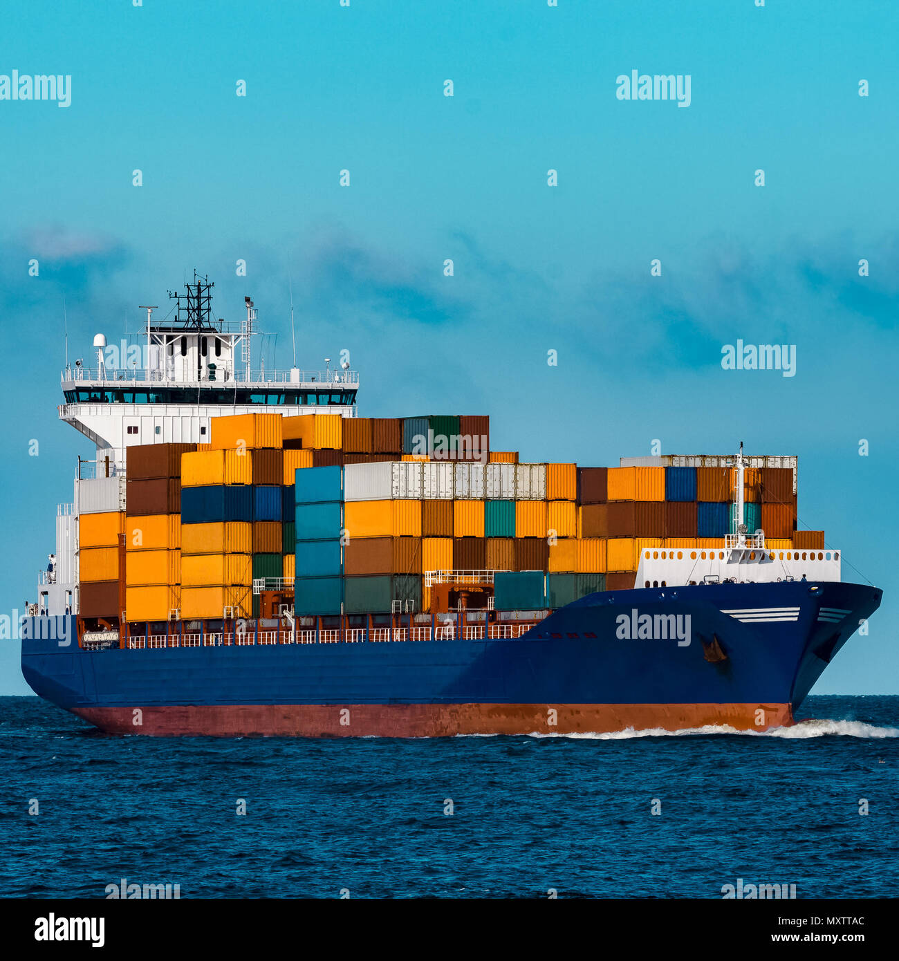 Blue container ship in travel. Logistics and freight industry Stock ...