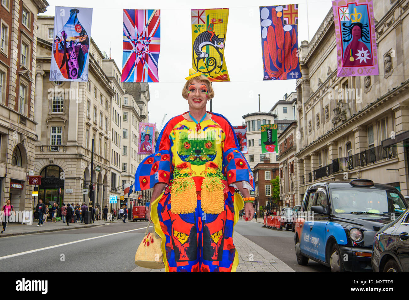 Artist Grayson Perry pictured on Piccadilly in London, in front of ...