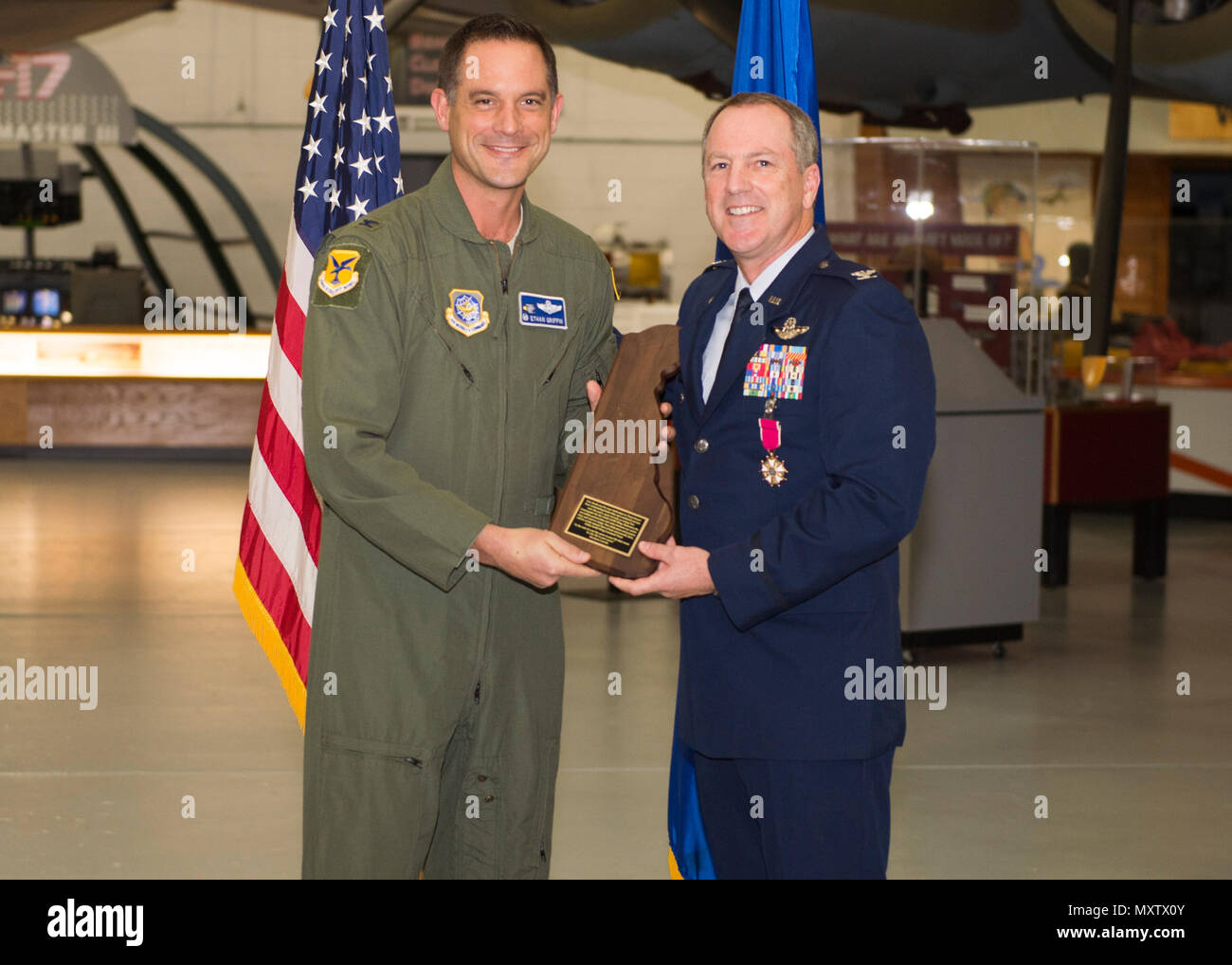 Col. Ethan C. Griffin, 436th Airlift Wing commander, presents Col ...