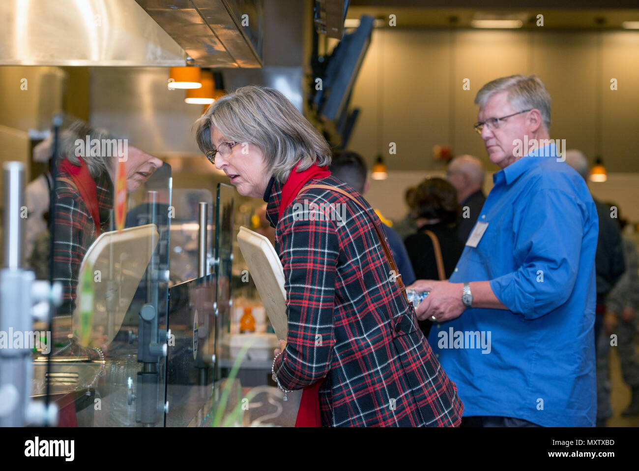 Jean Boyko looks at the available lunch choices while her spouse Dr. Greg Boyko, 60 Medical ...