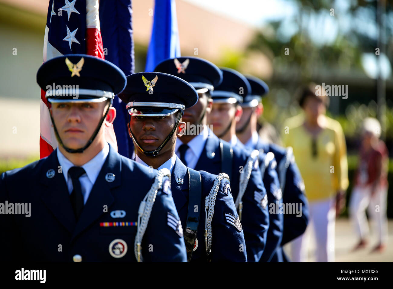 The U.S. Pacific Air Forces color guard prepares to post colors during ...