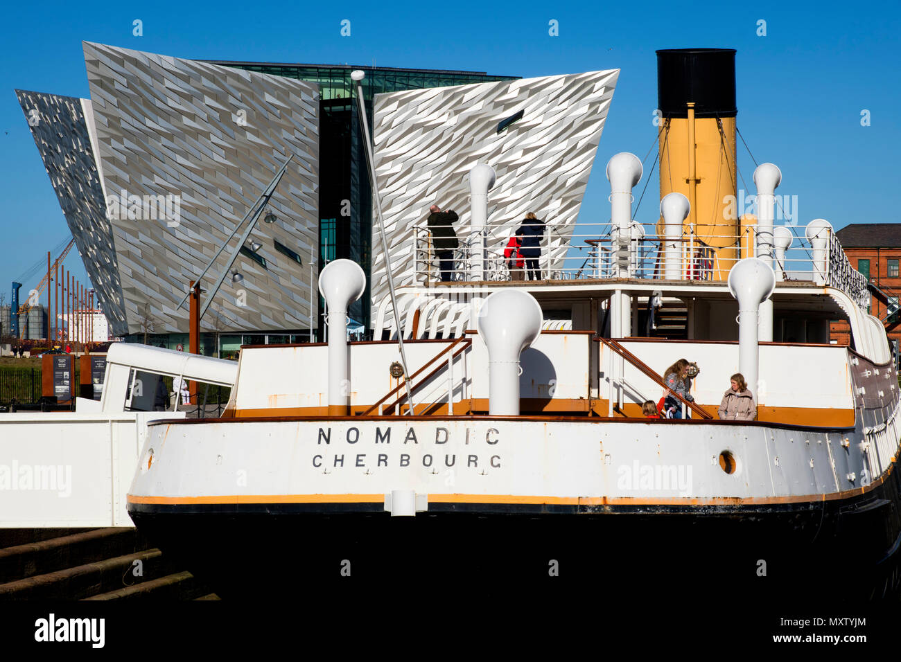 The Nomadic ships docked at Titanic Belfast exhibition Stock Photo - Alamy
