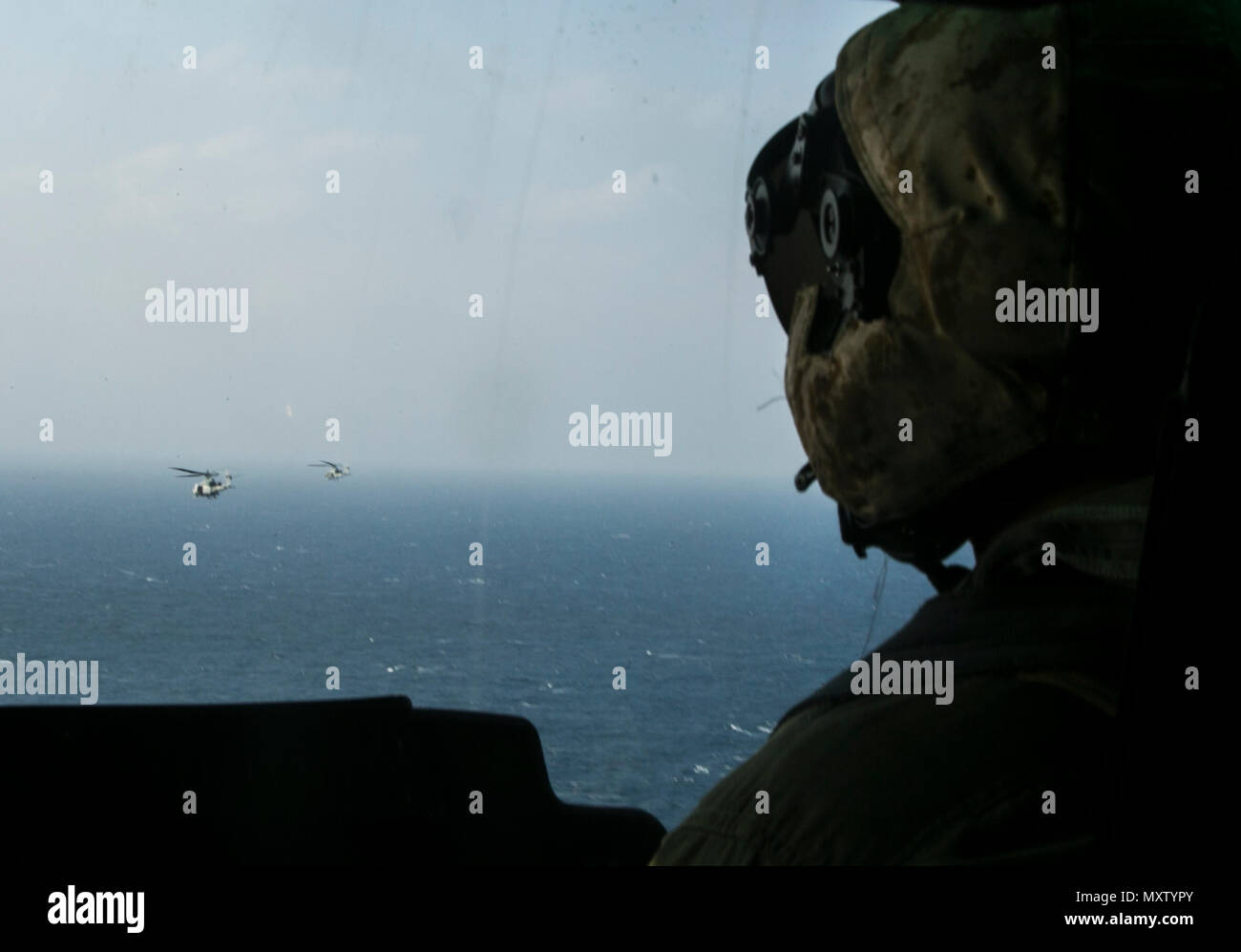 UH-1Y Hueys and AH-1Z Vipers reach an objective off the coast of ...