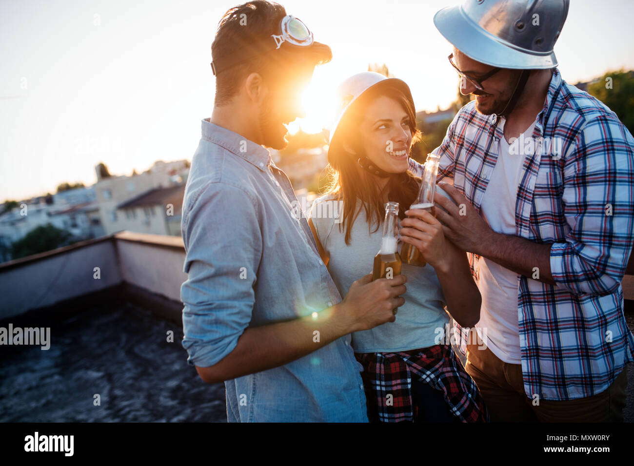 Happy cheerful friends spending fun times together Stock Photo - Alamy