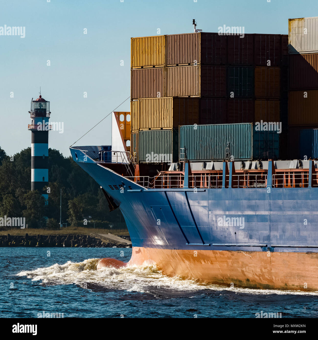 Blue container ship in travel. Logistics and freight industry Stock ...