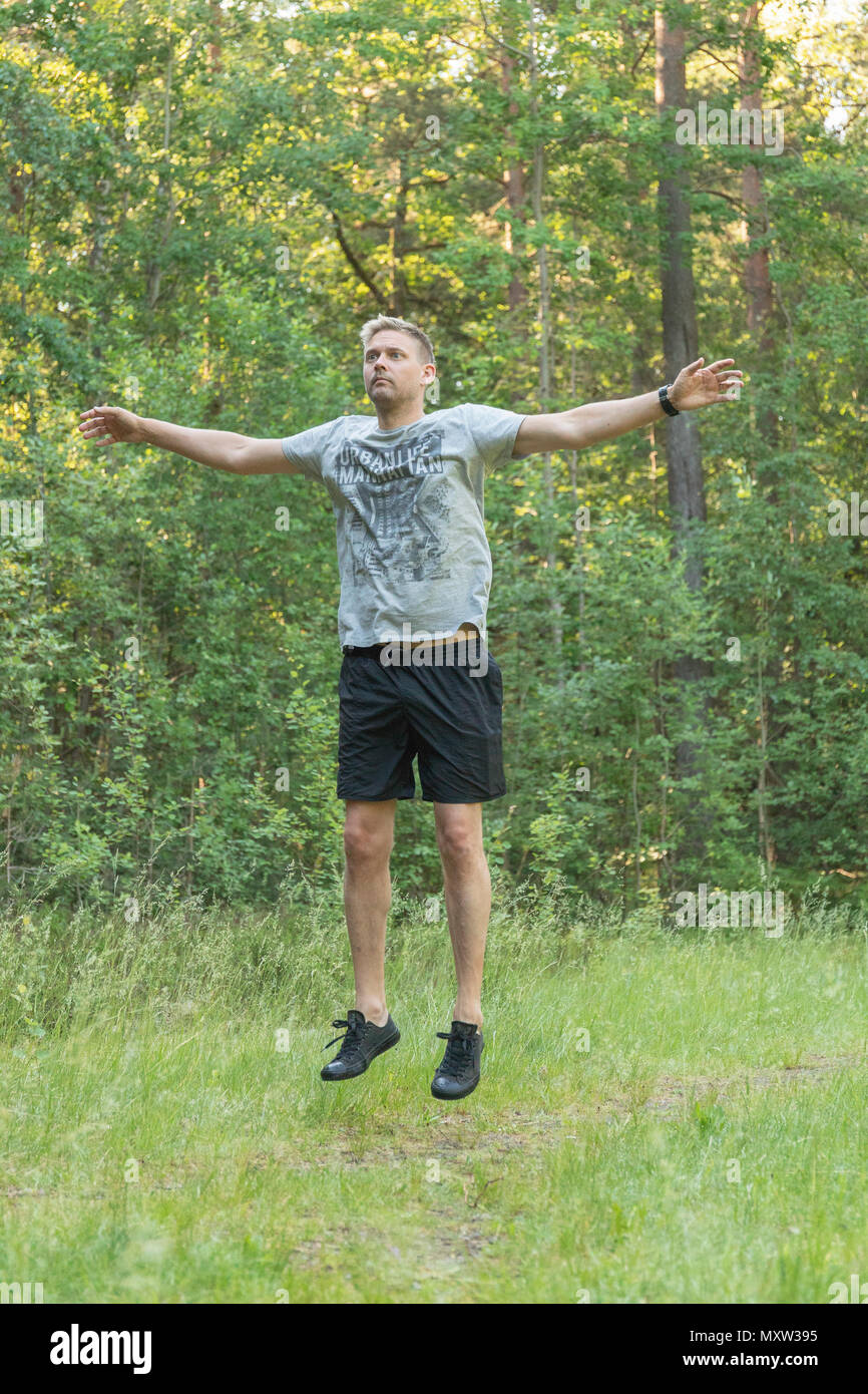 Man floating air hi-res stock photography and images - Alamy