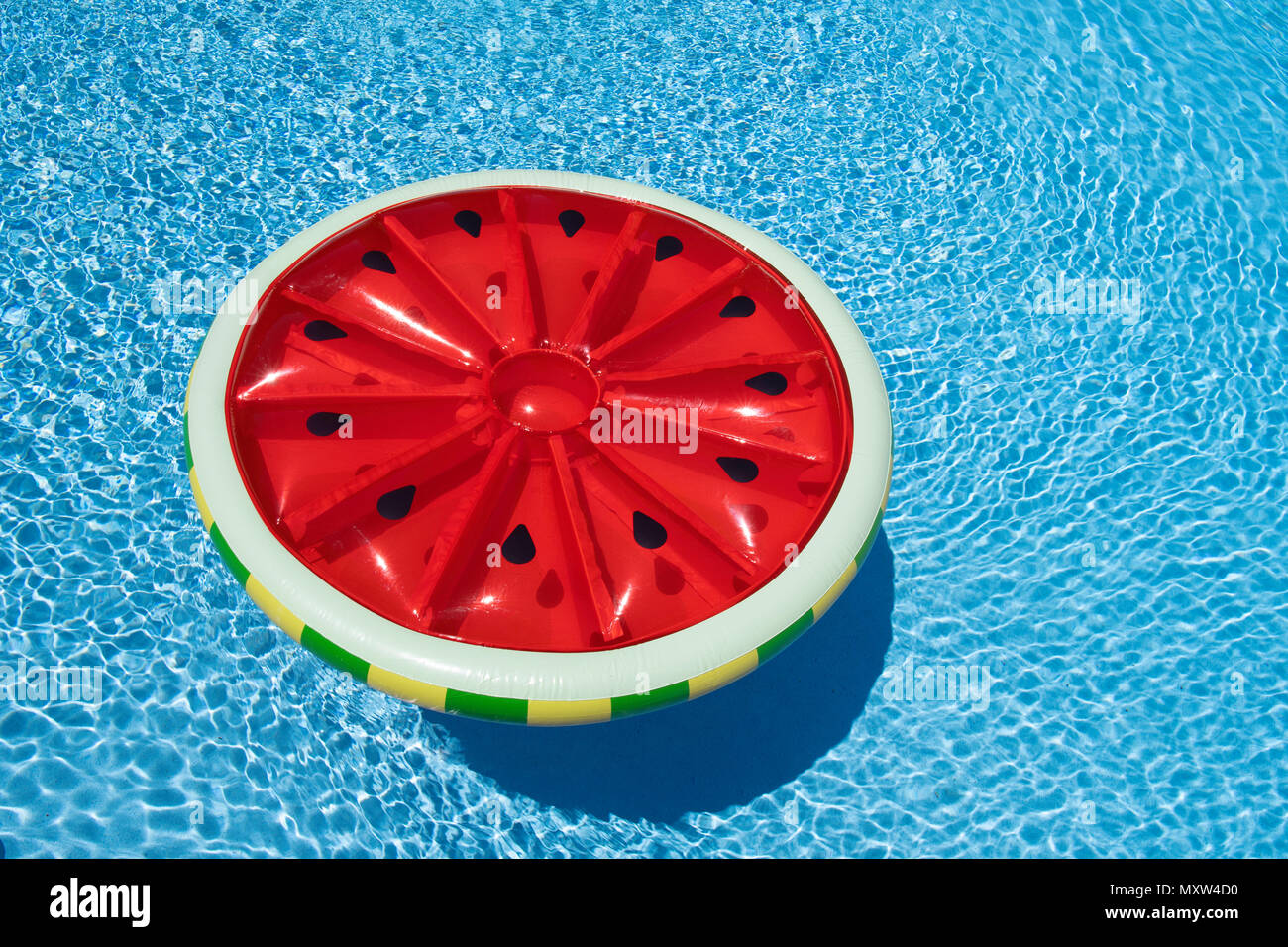 Watermelon float in the pool Stock Photo - Alamy