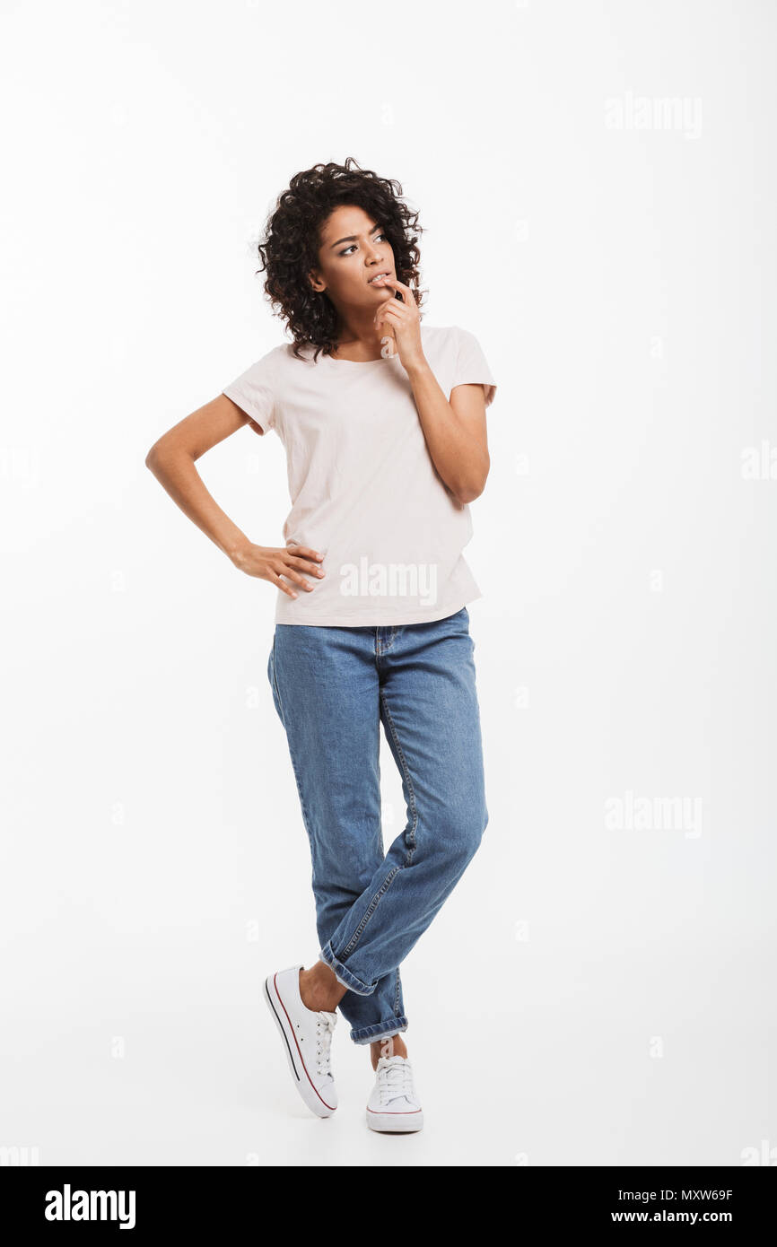 Full length photo of dreaming american woman with brown locks looking ...