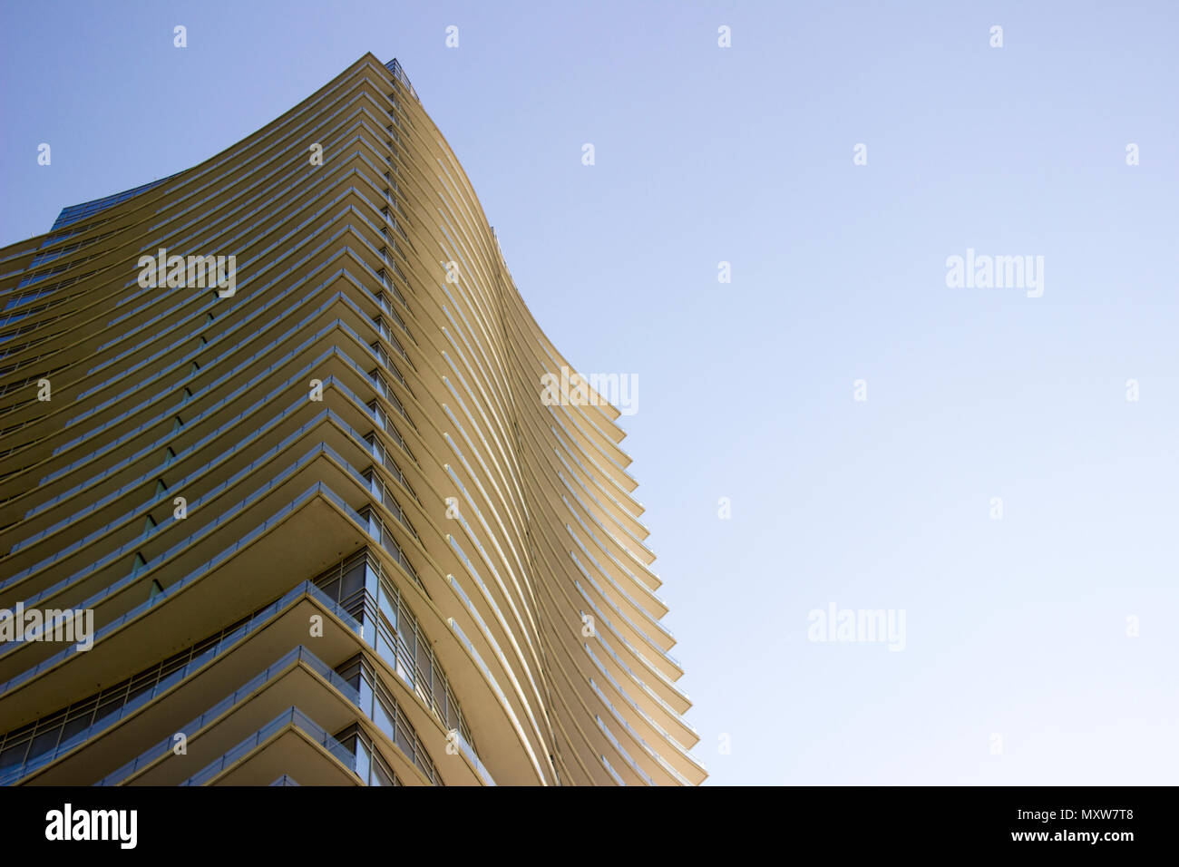 Side low angle view of a modern corporate office building with ...