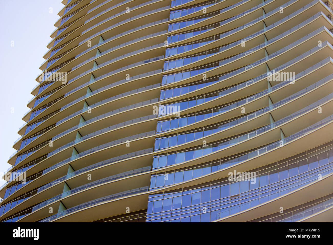 Side view of a modern corporate office building with overhangs in each ...