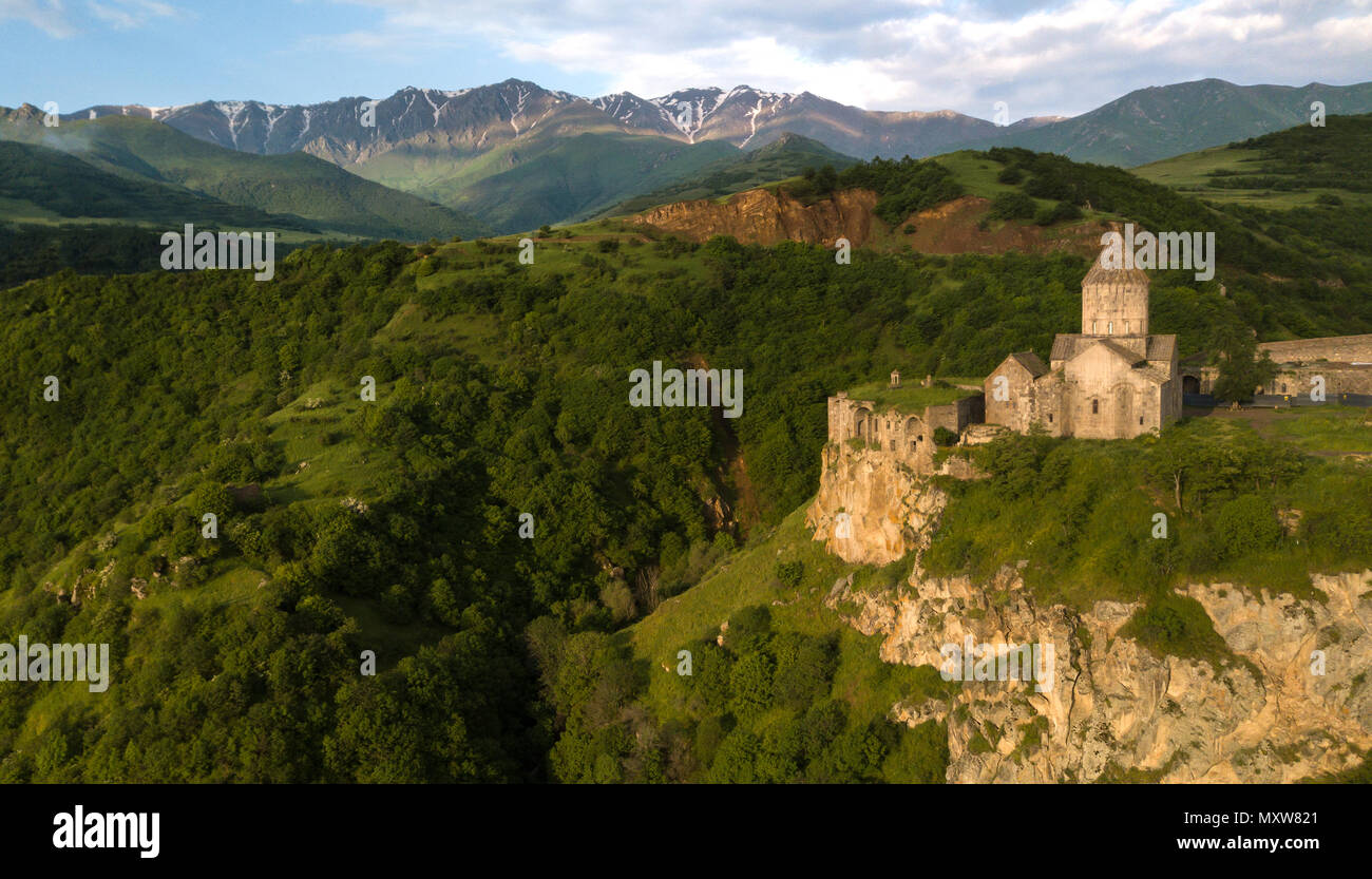 8th century ancient Tatev monastery on the cliffs during morning light ...