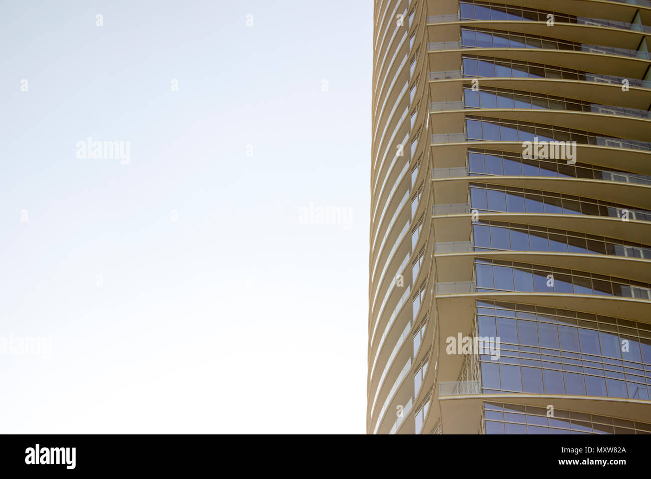 Side low angle view of a modern corporate office building with ...