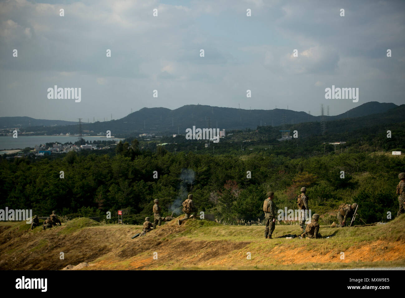 EASTERN TRAINING AREA, OKINAWA, Japan – 60mm mortars fire for effect at ...
