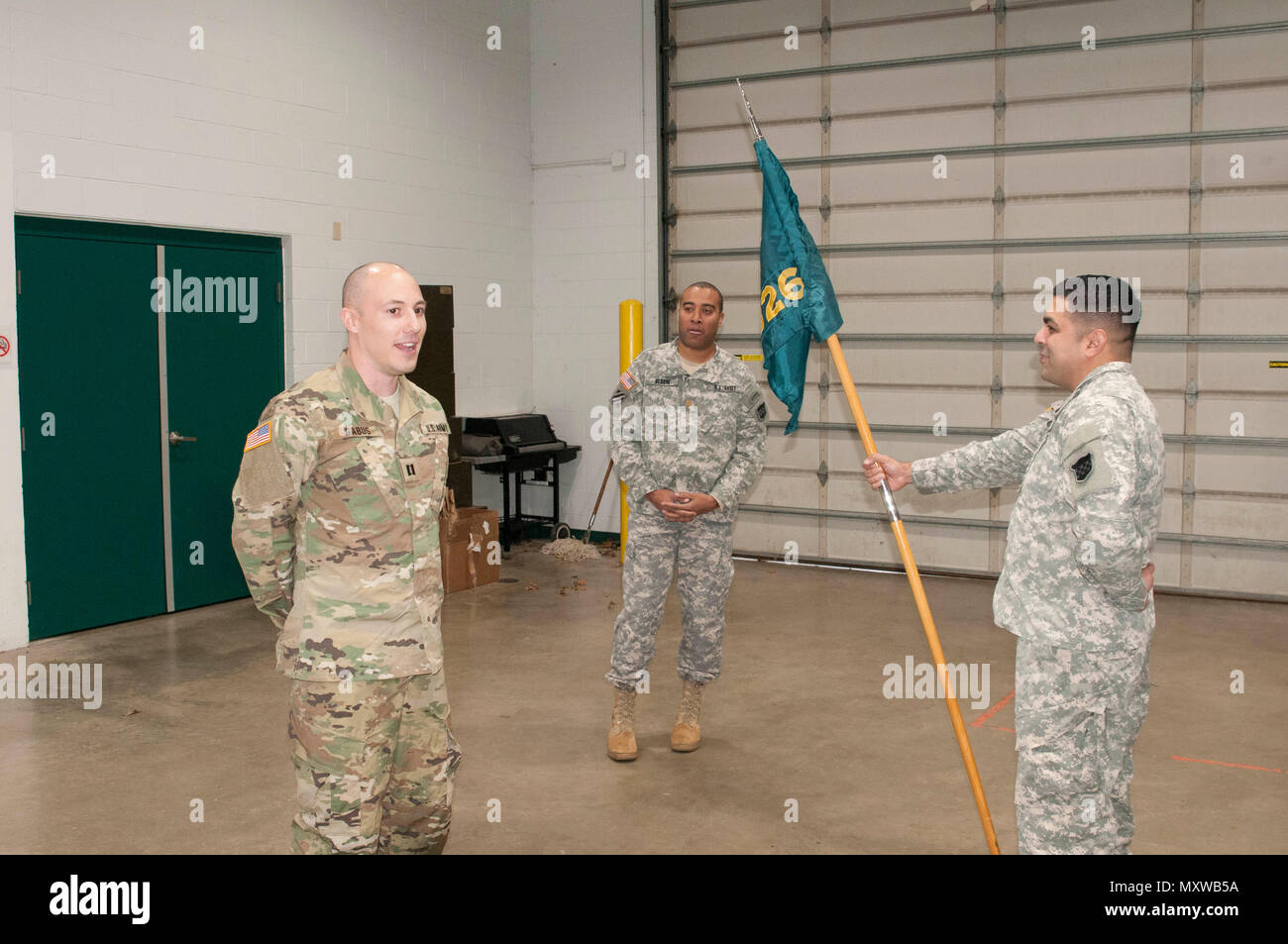 Capt. Dustin Gabus, Public Affairs Officer of the 214th MPAD, addresses ...