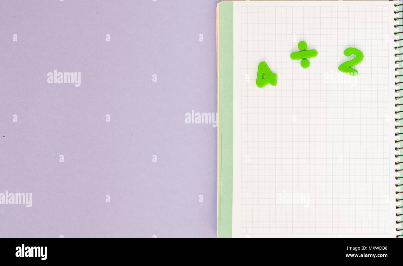 Learning maths. Kid's desk with blank notebook and numbers top view ...