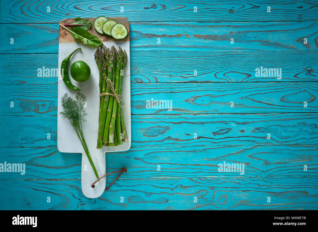 Healthy food vegetables for heart heath on wooden turquoise background ...