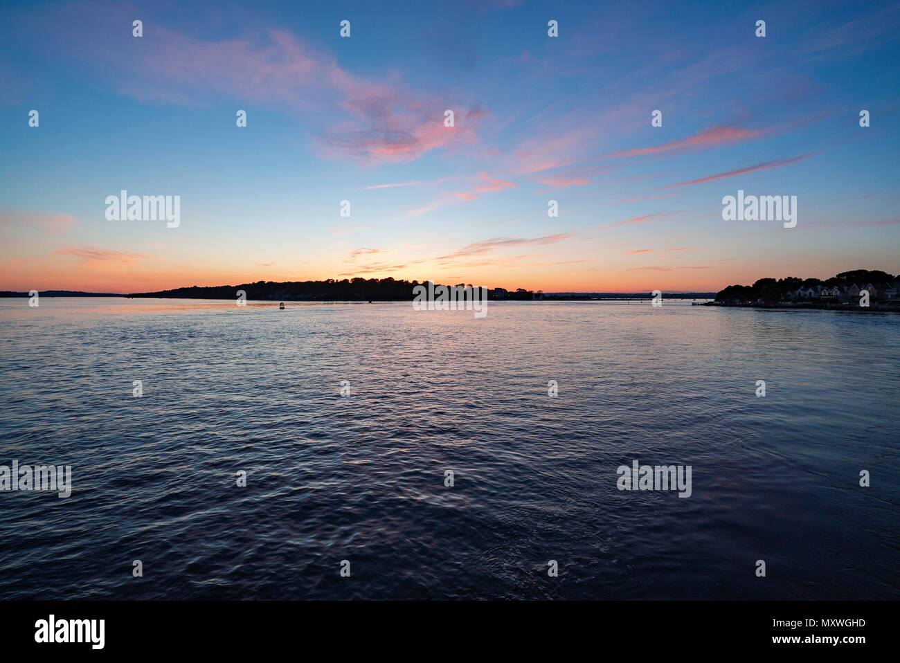 Poole Harbour at sundown Stock Photo - Alamy