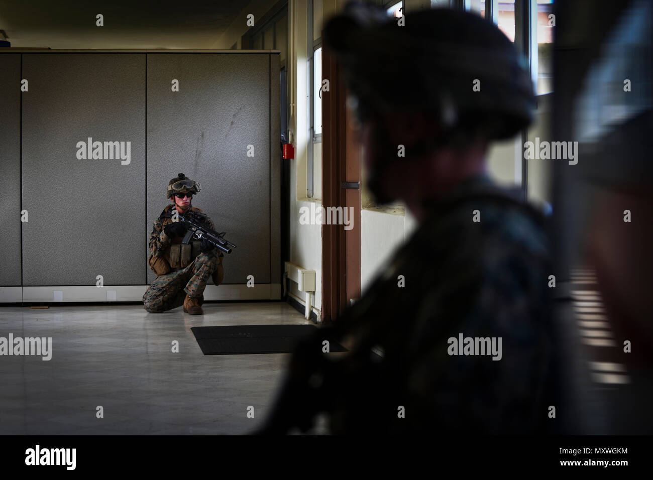 Marines with Alpha Company, 1st Battalion, 3rd Marine Regiment, provide ...
