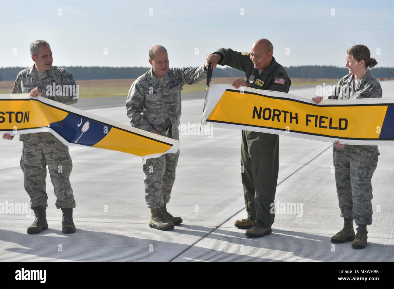U.S. Air Force Col. Jimmy Canlas 437 Airlift Wing commander, middle ...
