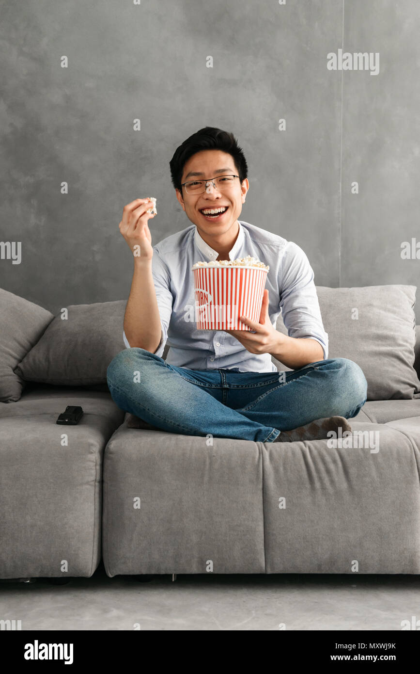 Man eating popcorn hi-res stock photography and images - Alamy