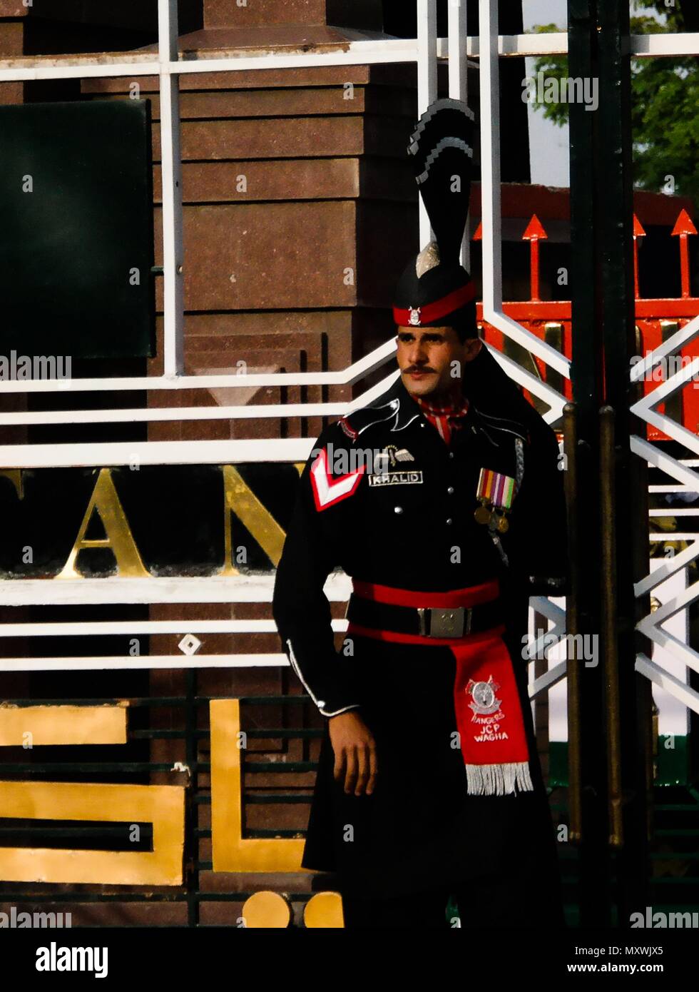 The marching Pakistani guards in national uniform at the ceremony of ...