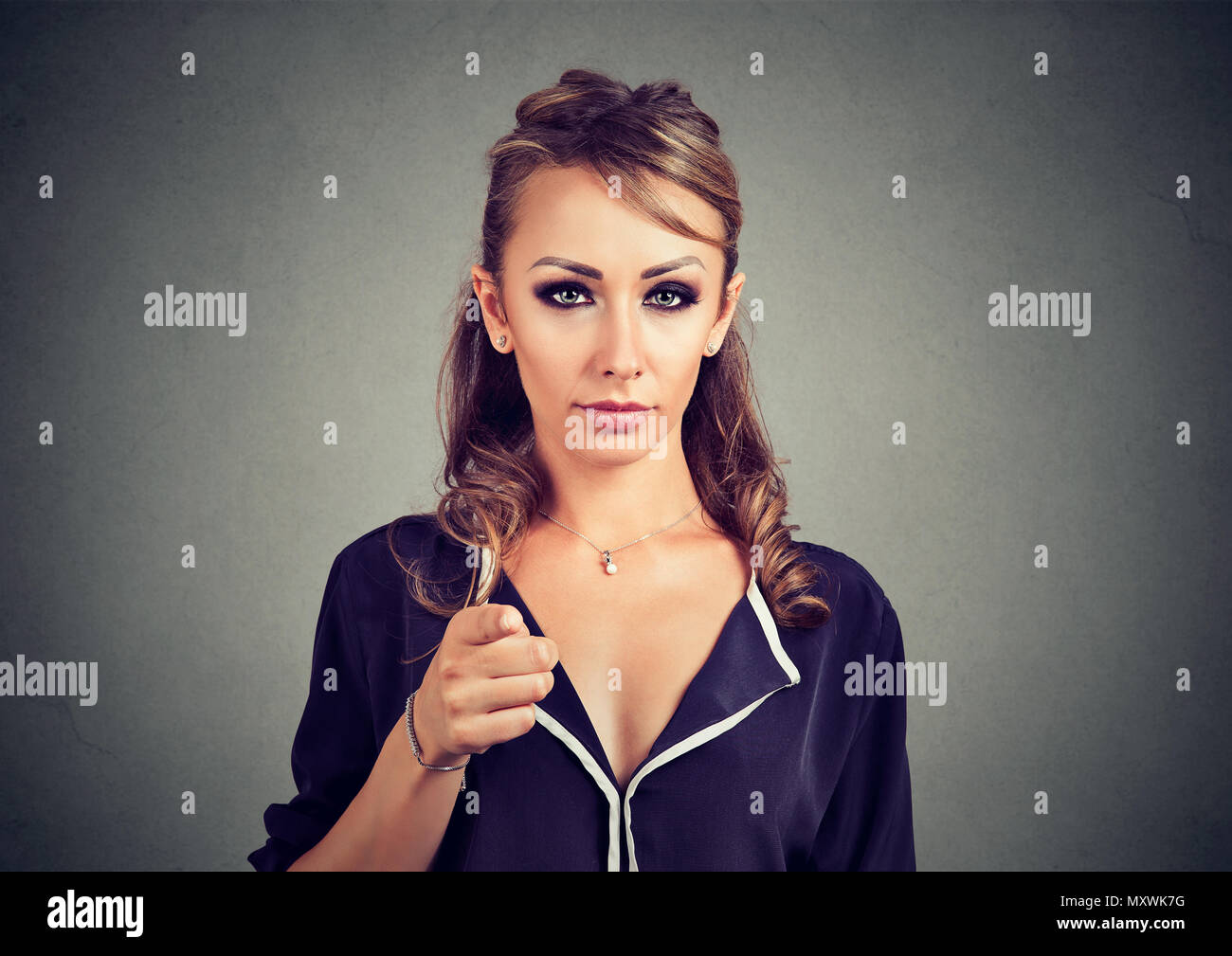 Woman pointing at camera hi-res stock photography and images - Alamy