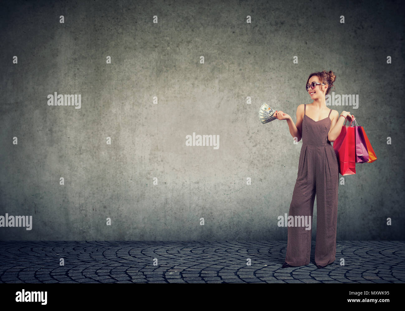Wasting money hi-res stock photography and images - Alamy
