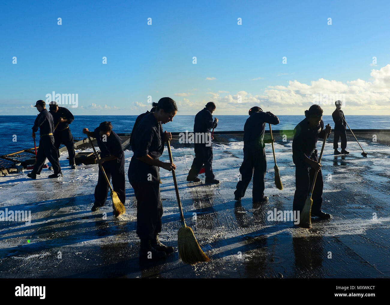 Sailors cleaning the deck of the ship hi-res stock photography and ...