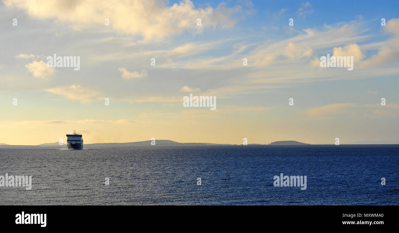 Oceanic ship in deep blue water of Aegean sea Stock Photo - Alamy
