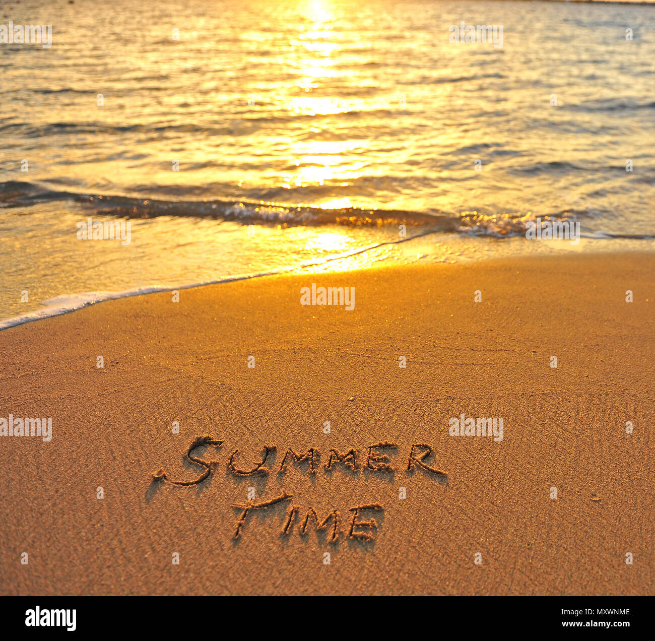 Summer time on sand beach background Stock Photo - Alamy