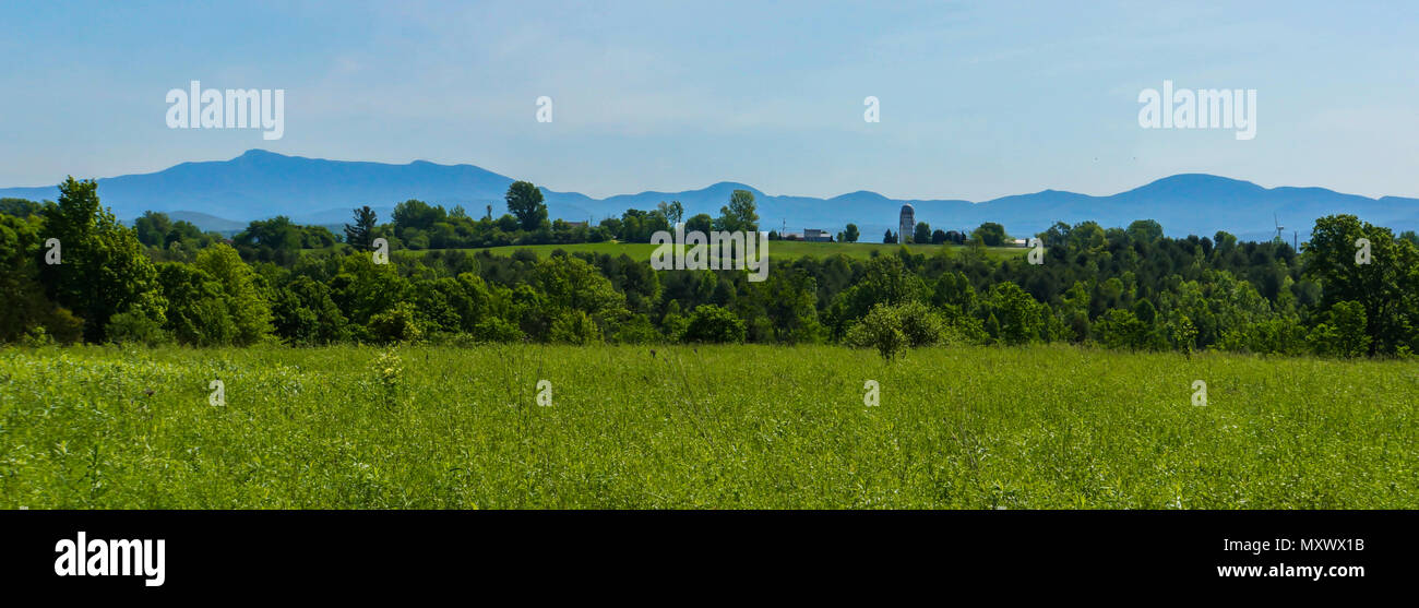 panorama of rural Vermont farm with the Green Mountains in the ...