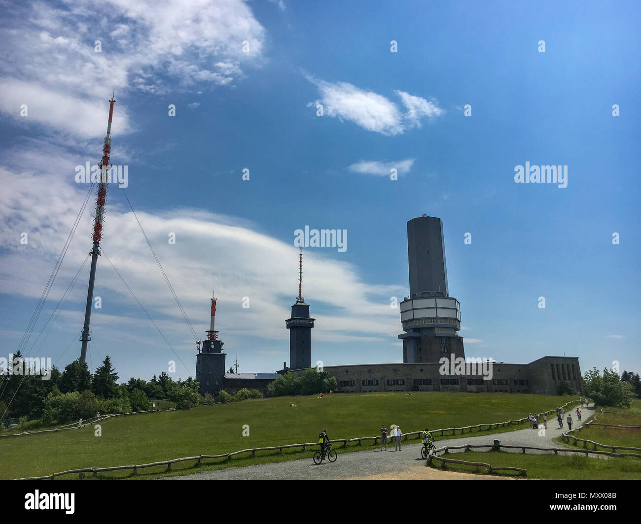 Schmitten, Germany - June 15, 2017: Several buildings, transmitter mast ...