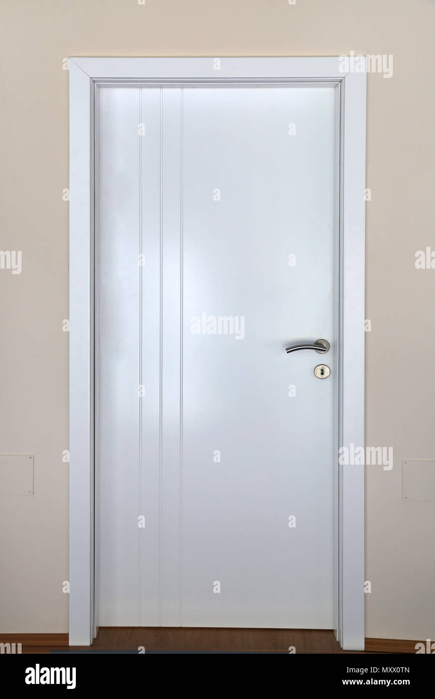 Simple White Door Closed in Home interior Stock Photo - Alamy