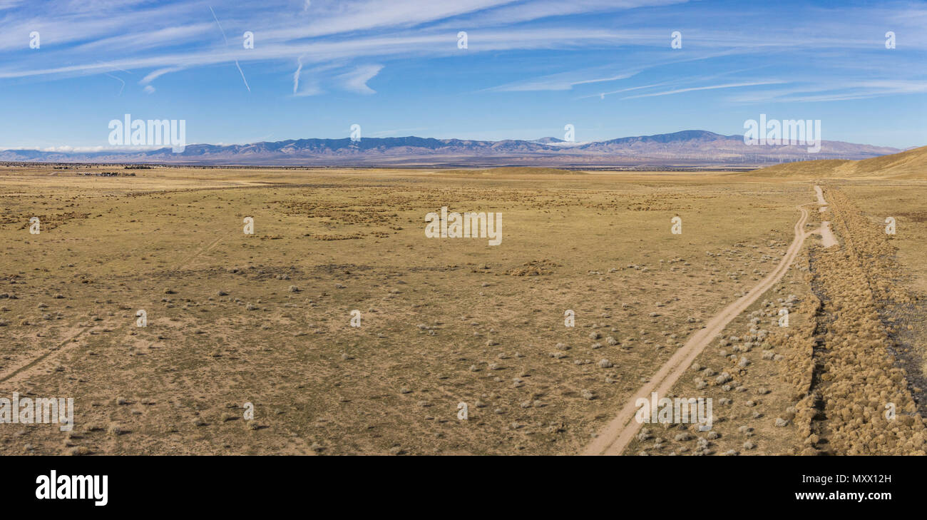 Panorama of dry desert plain during the California drought in central ...