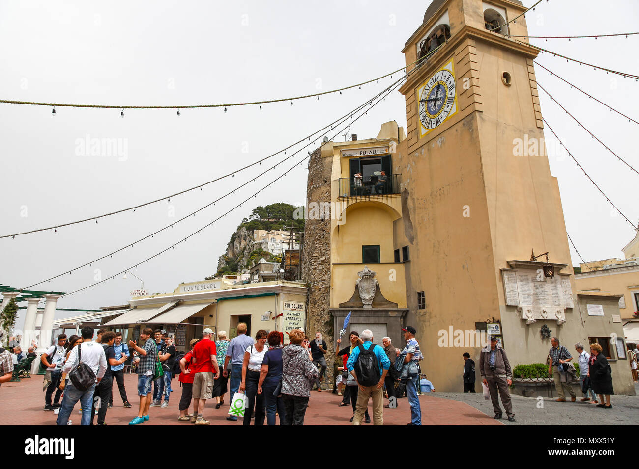 Clock tower, bell tower or campanile in the Piazza Umberto, on the ...