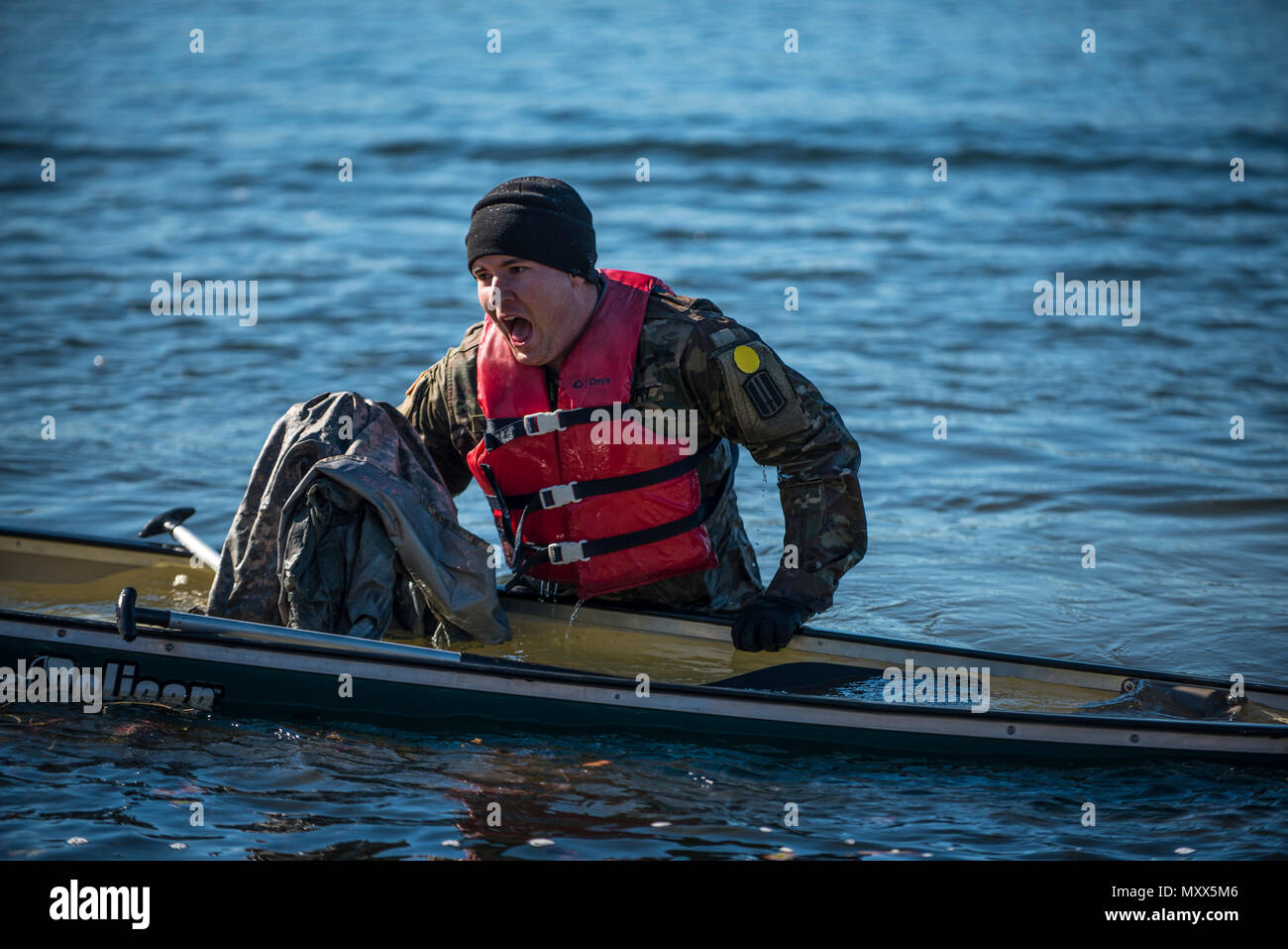 A Soldier participating in the Rubicon Command Team Challenge with the ...