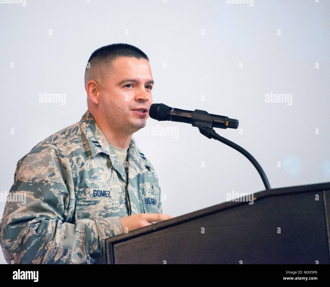 U.S. Air Force Capt. (Chaplain) Edwin Gomez provides remarks during the ...